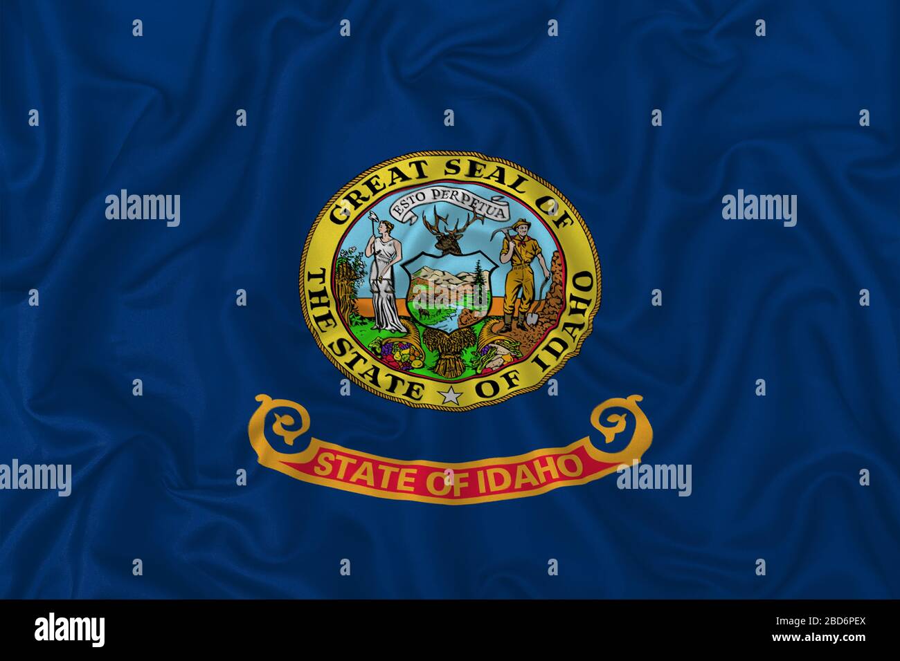 idaho state flag on a wavy silk satin fabric texture background Stock ...