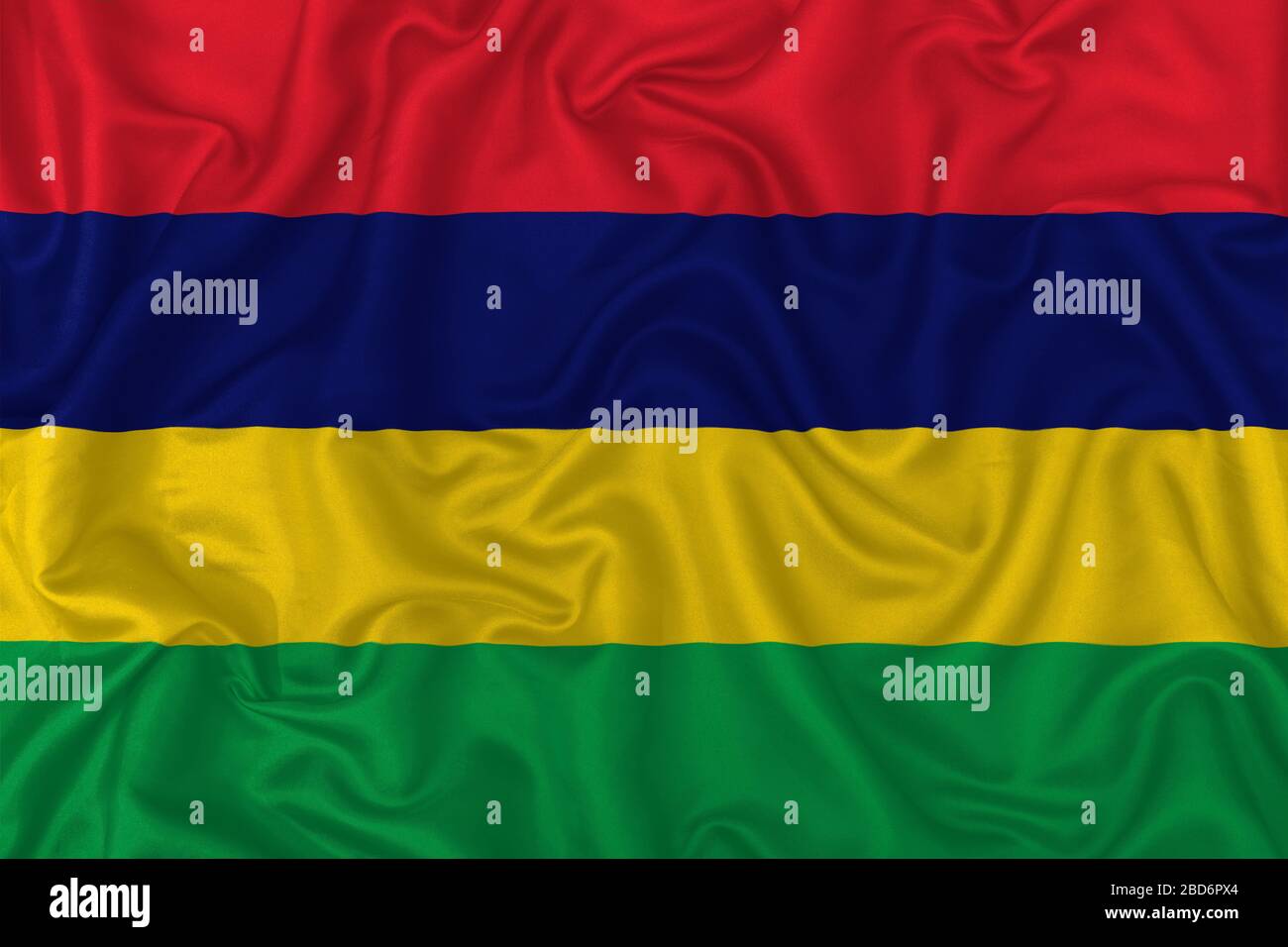 Mauritius country flag on wavy silk textile fabric background Stock ...