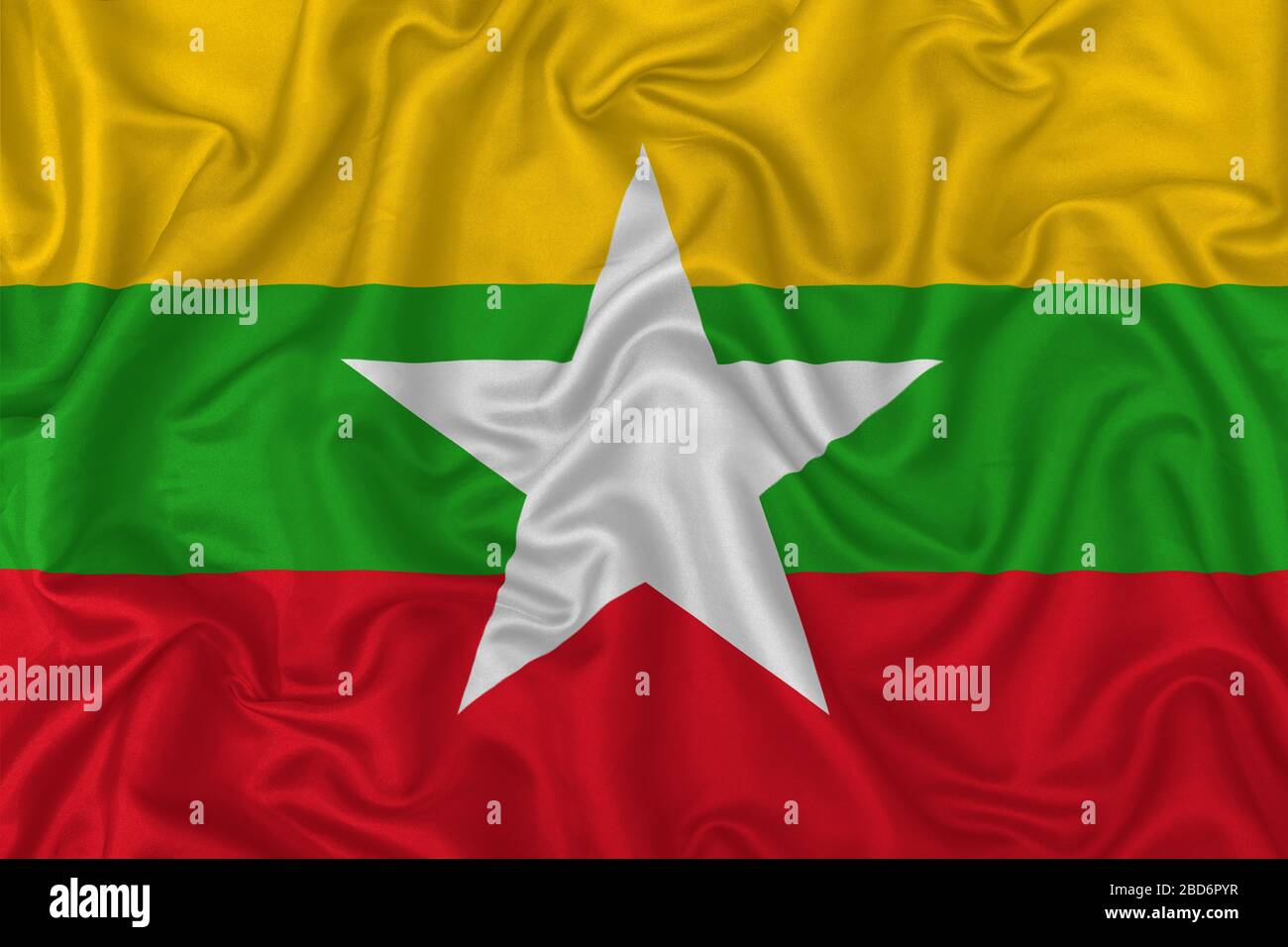 Myanmar country flag on wavy silk textile fabric background Stock Photo ...