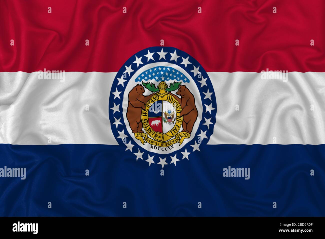 missouri state flag on a wavy silk satin fabric texture background ...