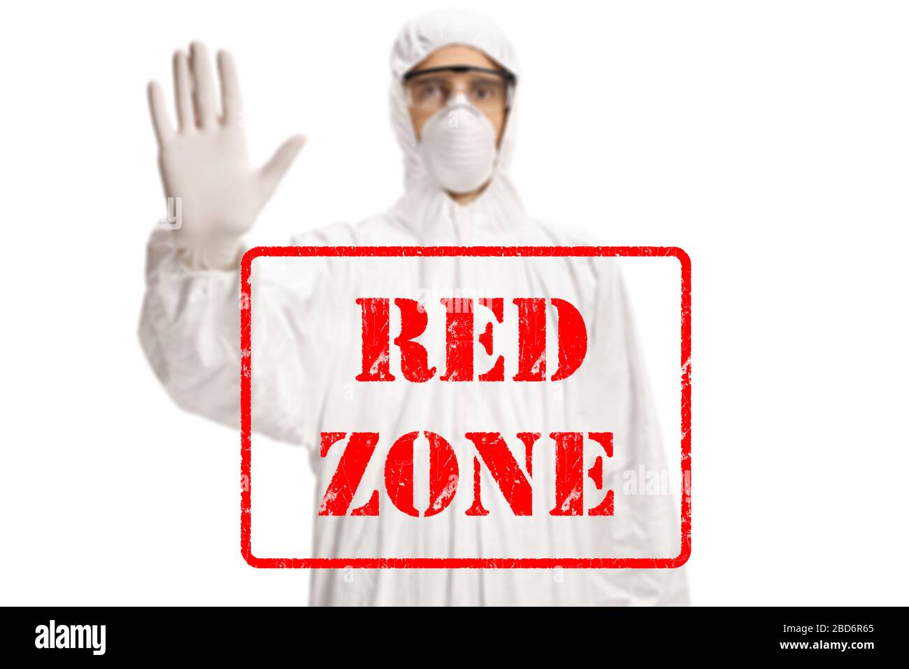 Written text red zone and a man in a white hazmat suit and mask ...