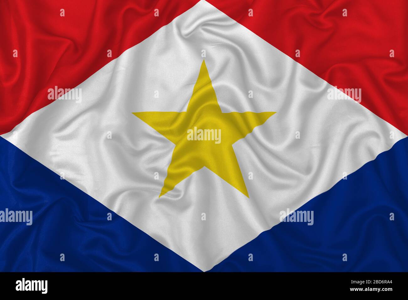 Saba island flag on wavy silk textile fabric background Stock Photo - Alamy