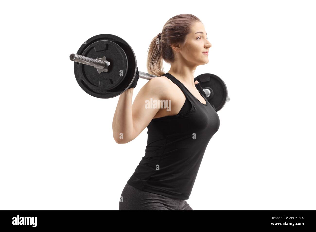 Woman lifting weigths isolated on white background Stock Photo - Alamy