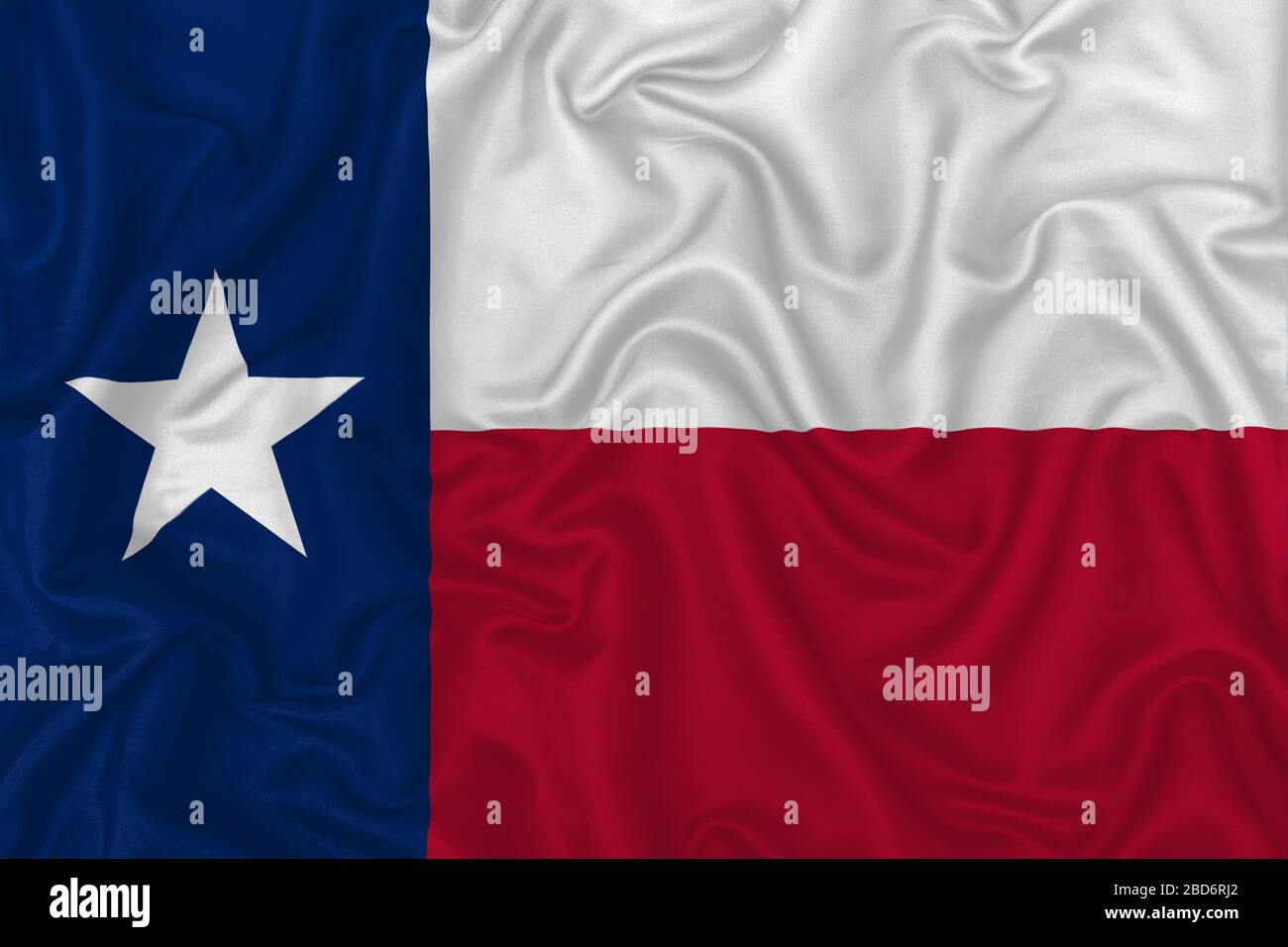 texas state flag on a wavy silk satin fabric texture background Stock ...