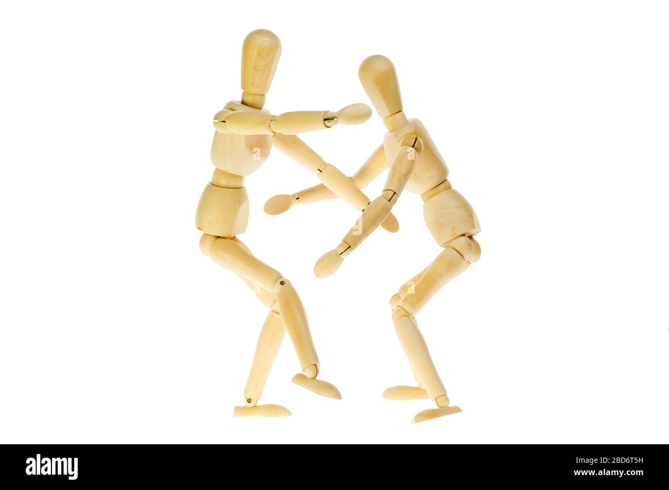 Two artists mannikins in a dancing pose isolated against white Stock ...