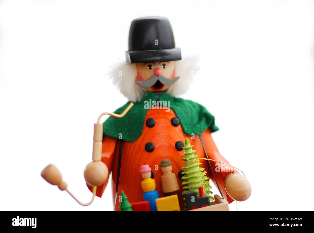 close up portrait of a traditonal german smoking men toy figure as ...