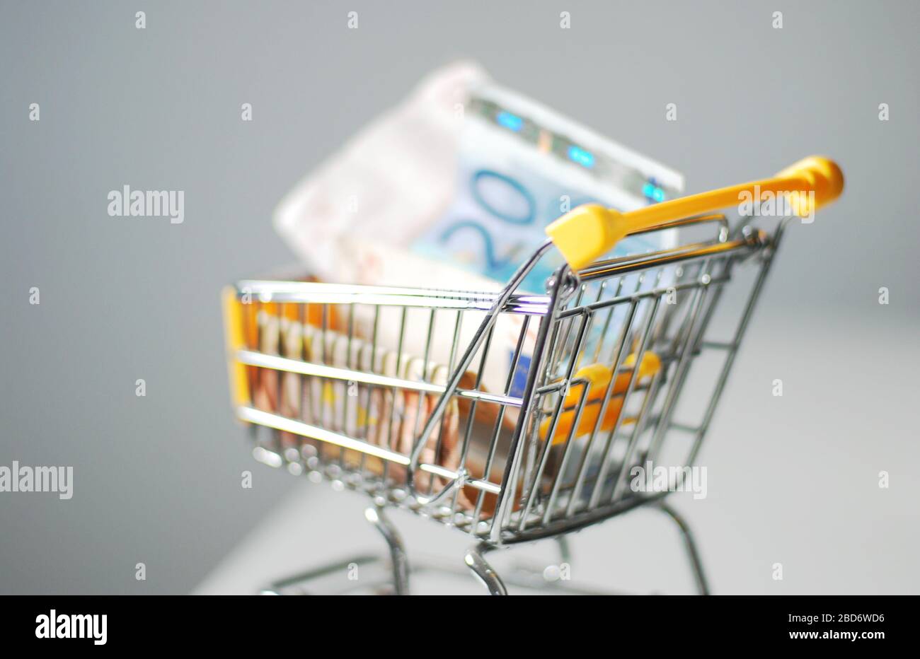 European money in a small trolley consumer concept Stock Photo - Alamy