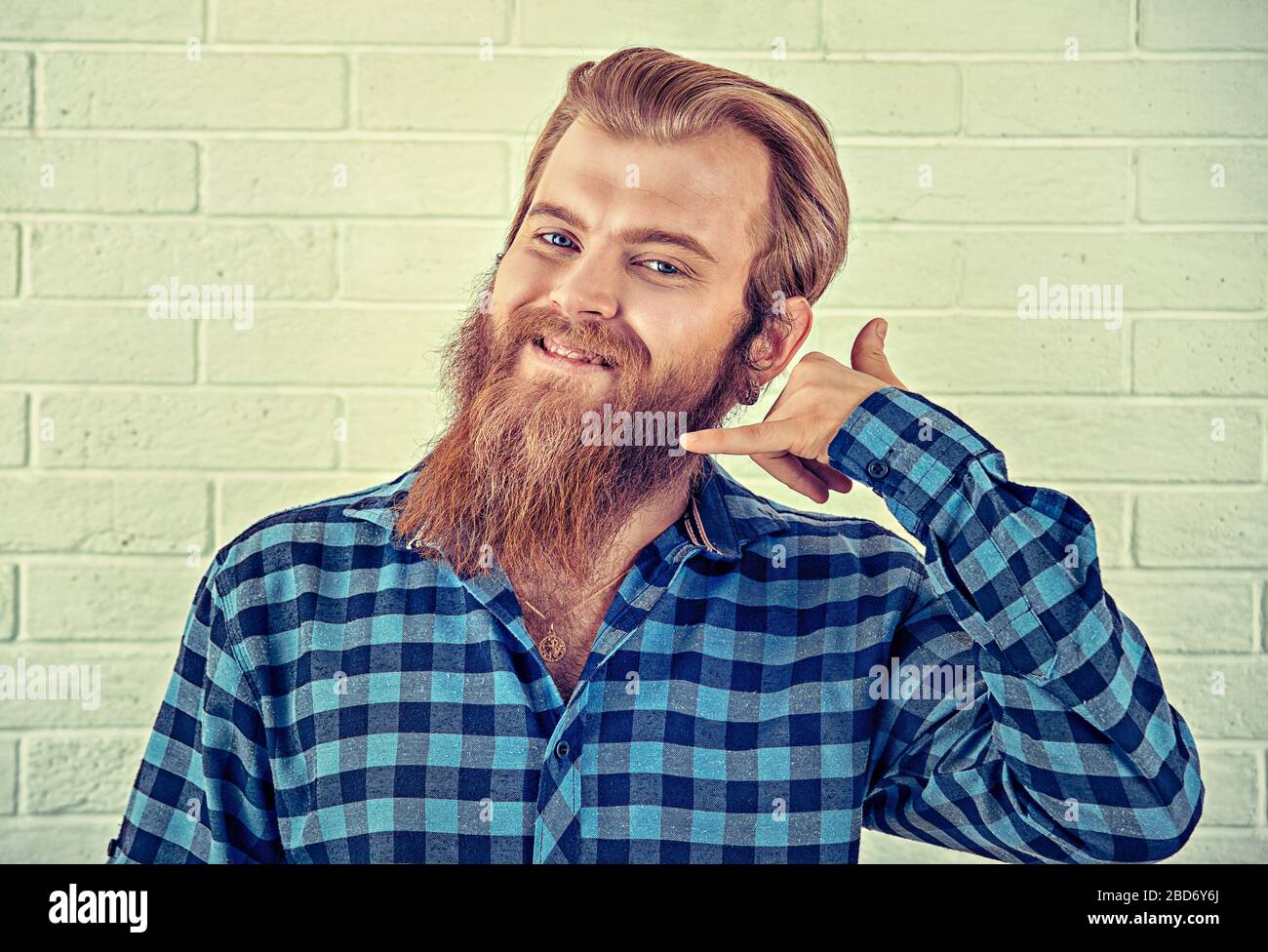 Close up handsome guy Business man looking at you camera showing call ...