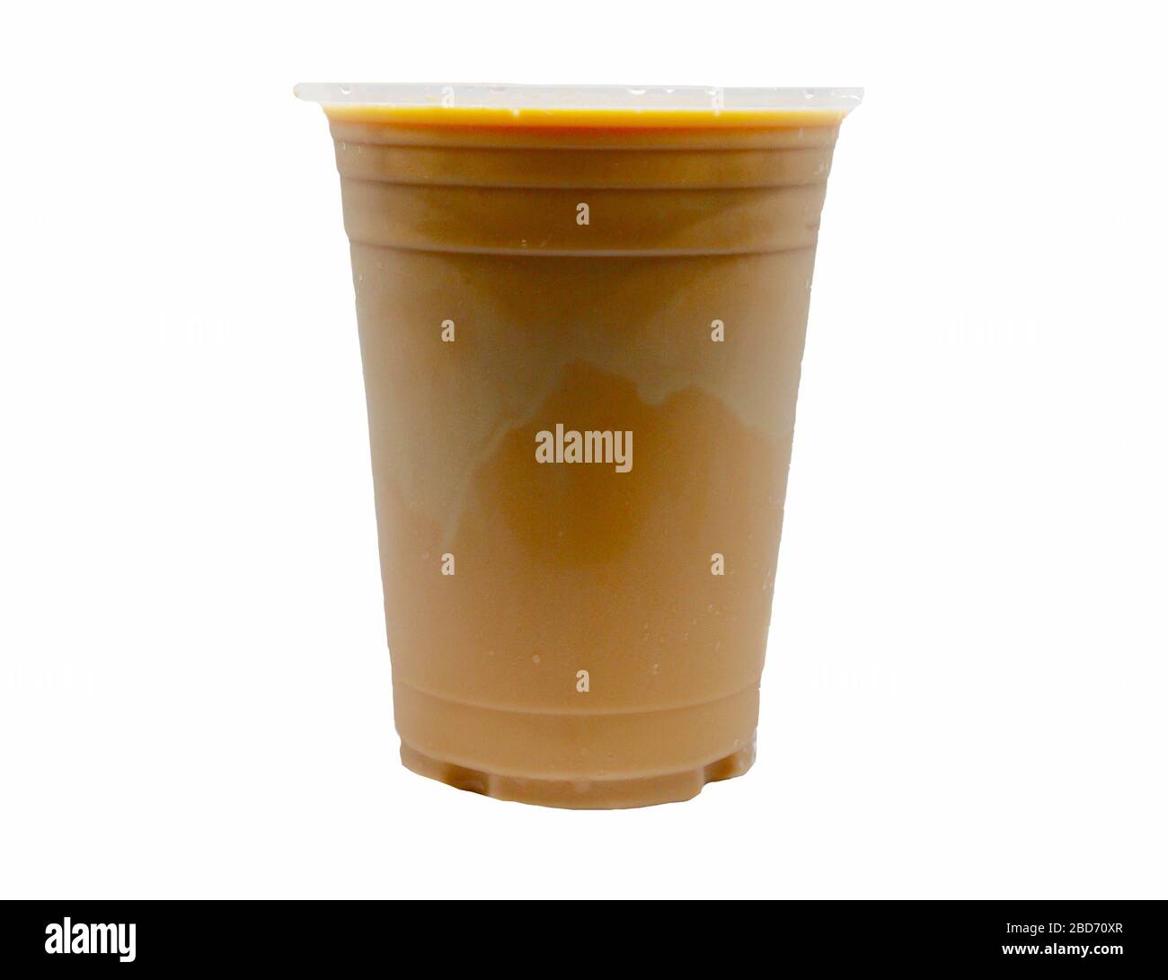 Iced thai tea with no ice in white background Stock Photo - Alamy
