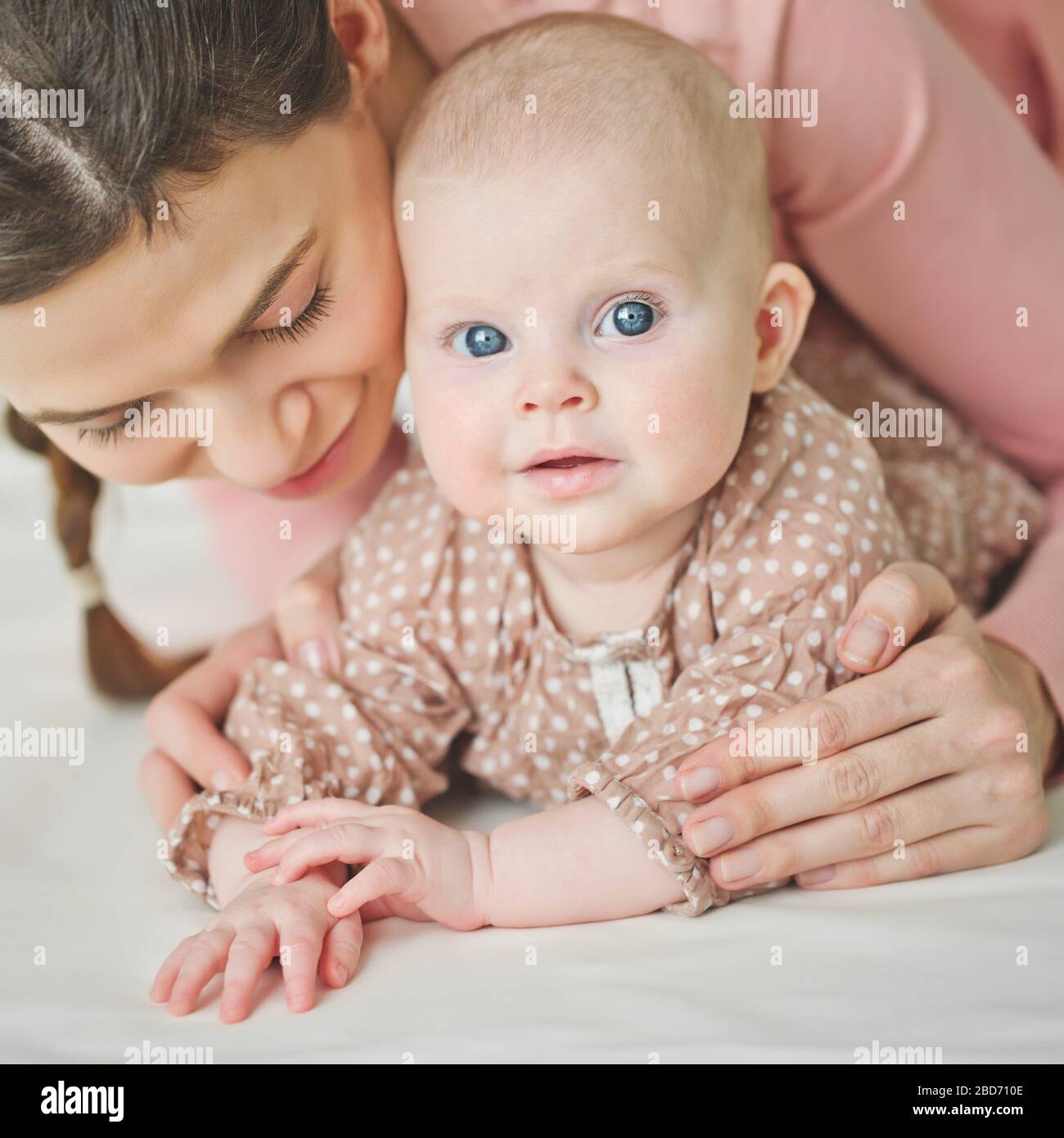 Mom with a baby Stock Photo - Alamy