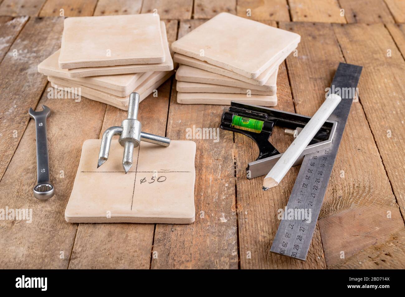 Drilling with a special drill in a ceramic tile. Tiling works during ...