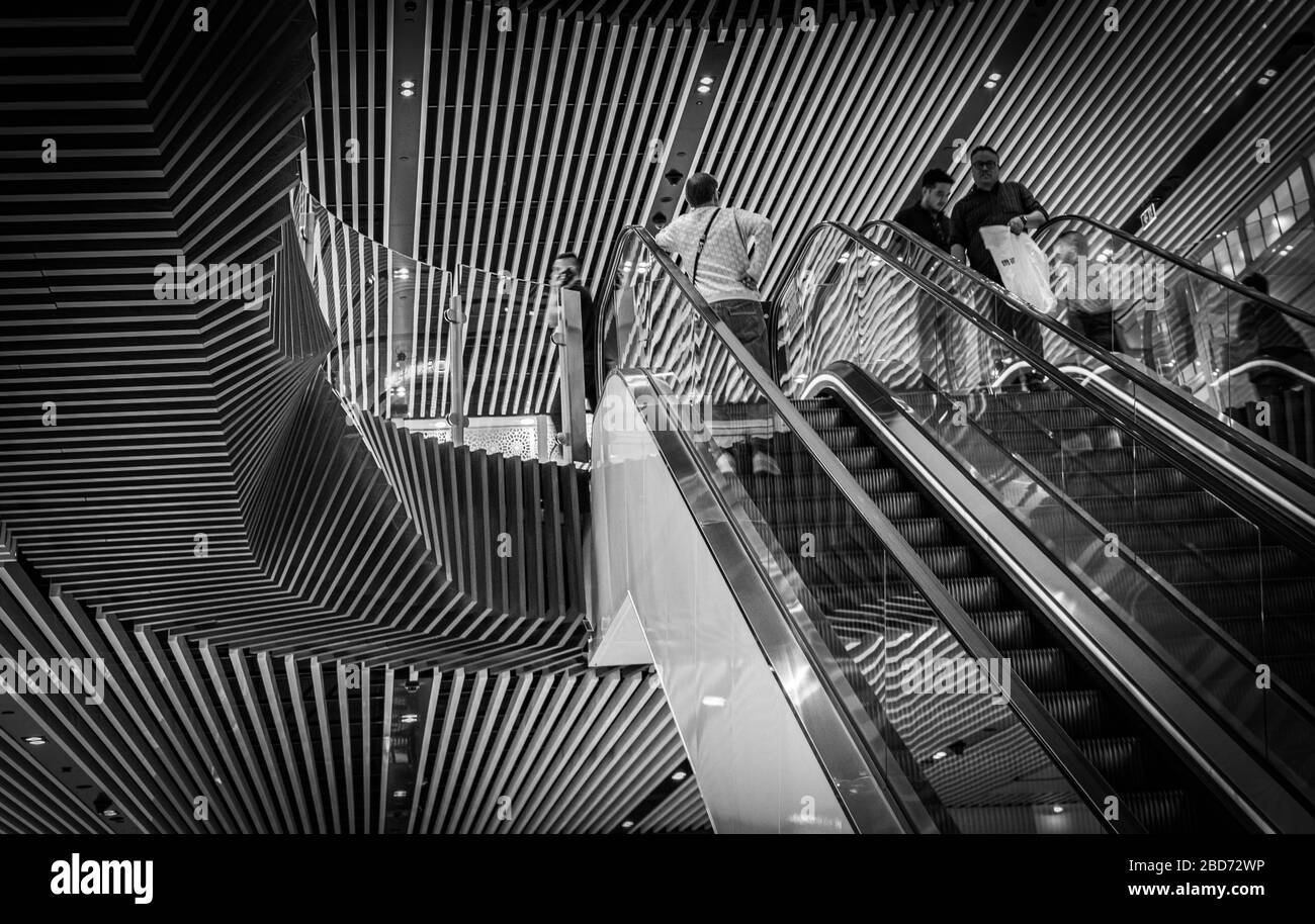 Melbourne Australia - March 9 2020; People on escalator surrounded by ...