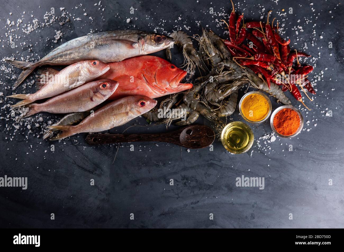 Red Snapper raw fish on table top Stock Photo - Alamy