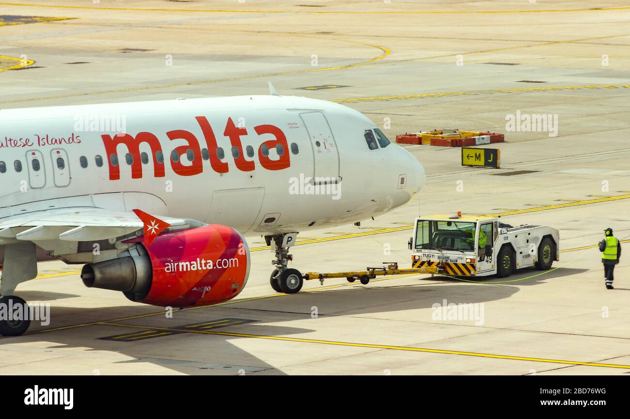 Aircraft Tug Pushing Airbus A320 High Resolution Stock Photography and ...