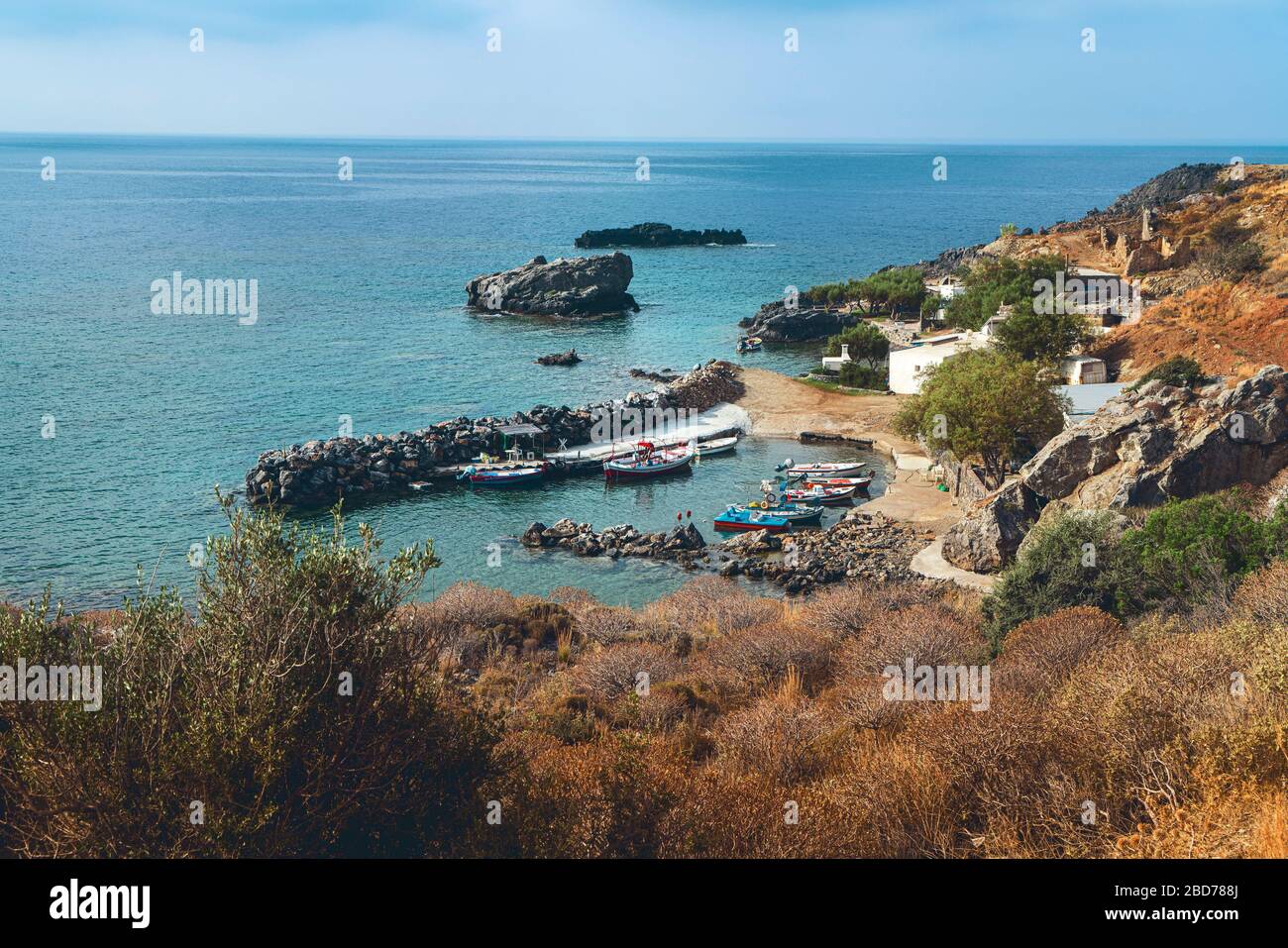 bay with small fishing boats on crete Stock Photo - Alamy