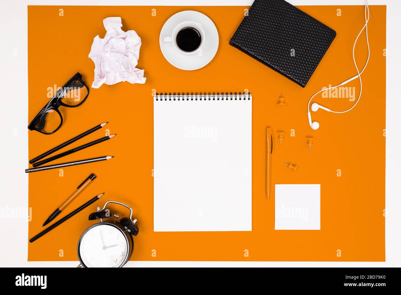 flat view of the office desk with a creative arrangement of items for ...