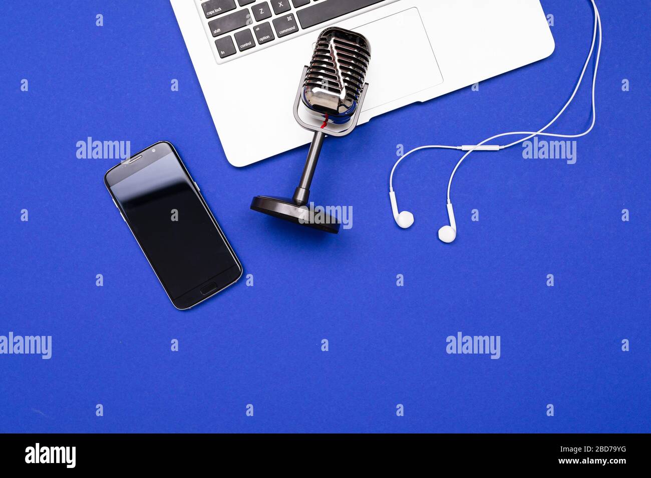 microphone for recording podcasts on a blue background for the screen ...