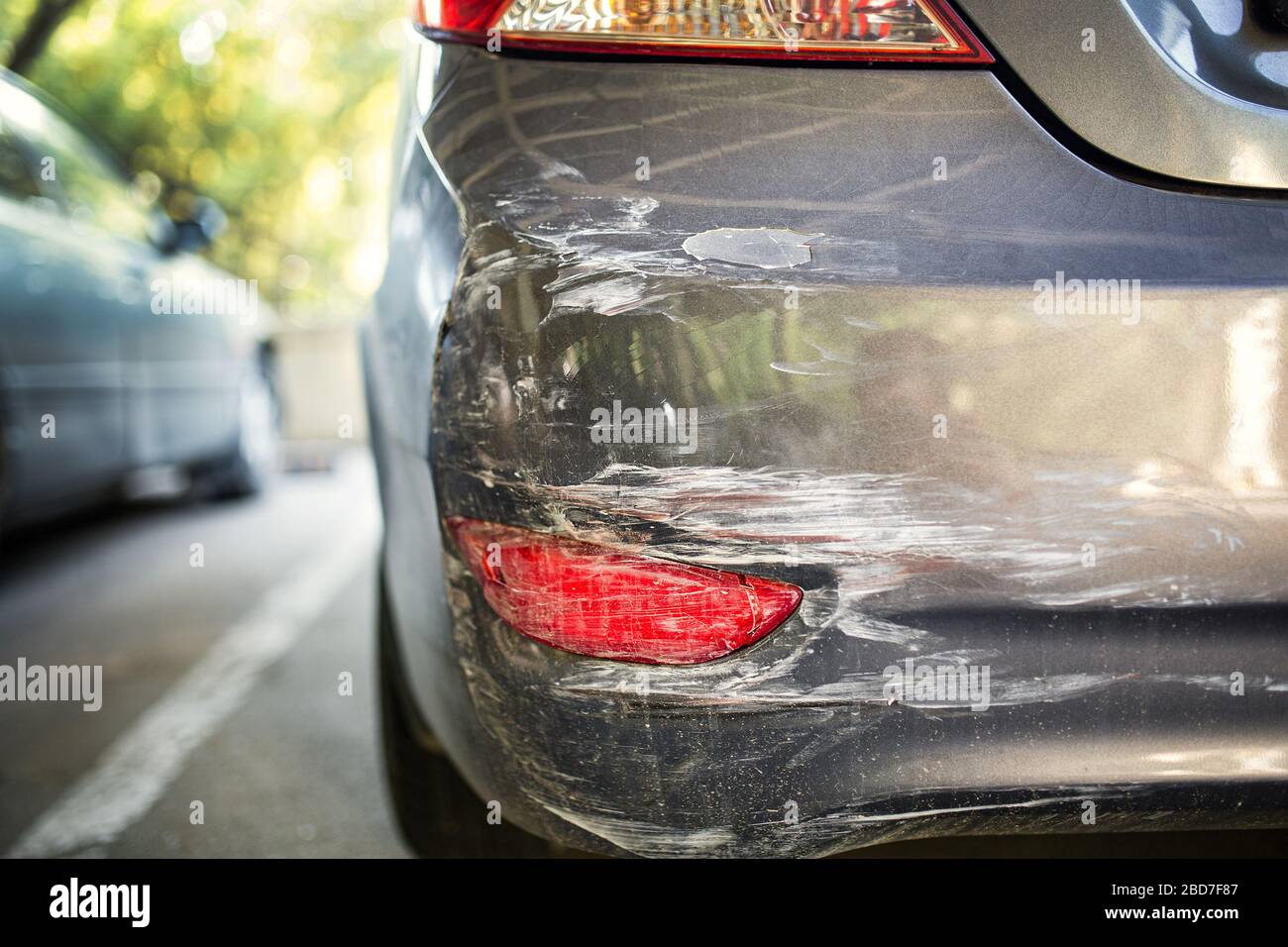 Backside of new silver car get scratched, damaged by accident on ...