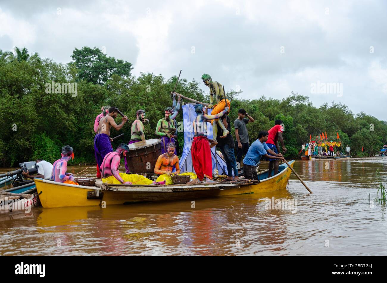 Men dressed up as mythological characters, acting out scenes from ...