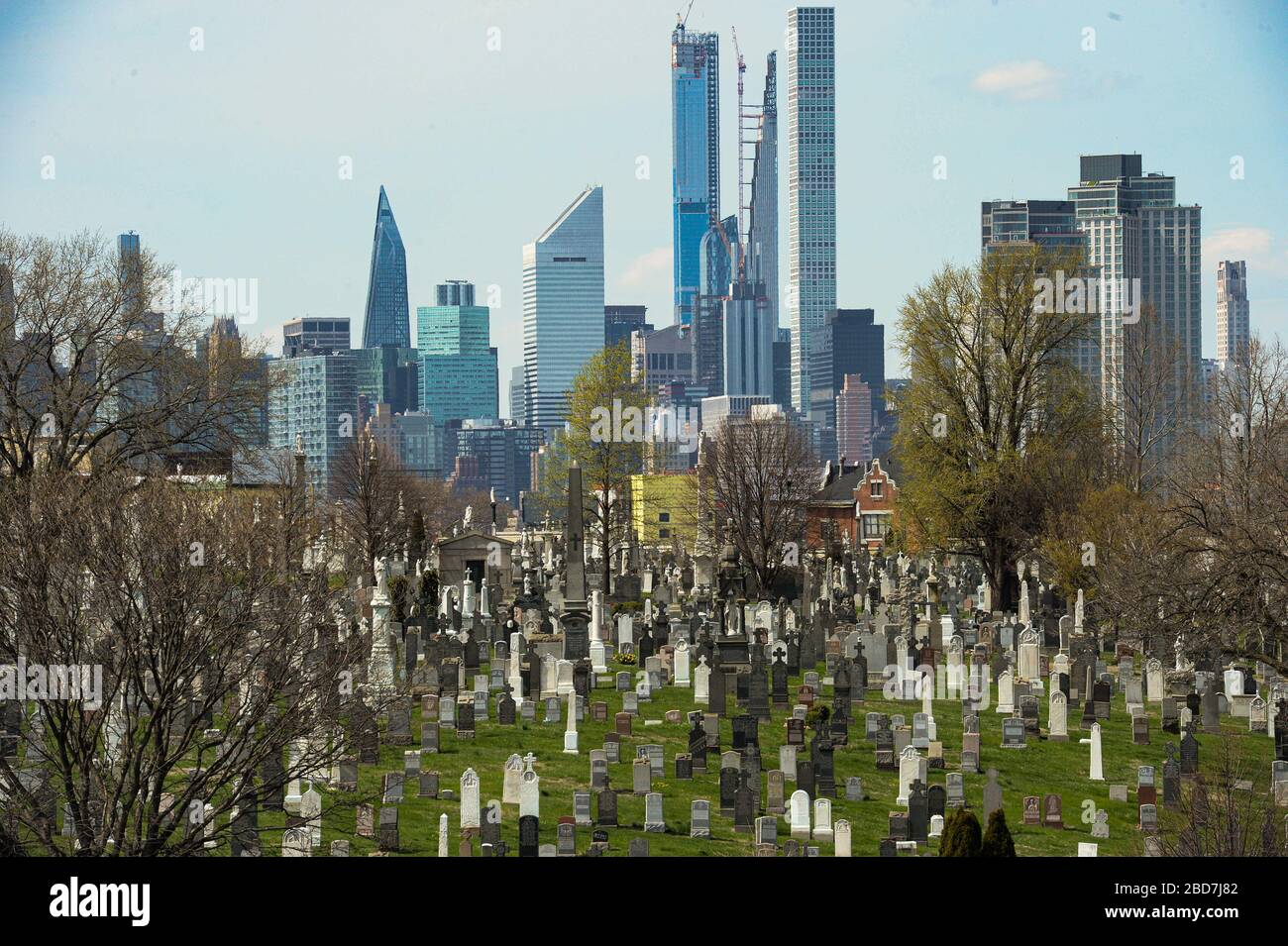 New York Queens, USA. 7th Apr, 2020. NYC skyline behind Calvary ...