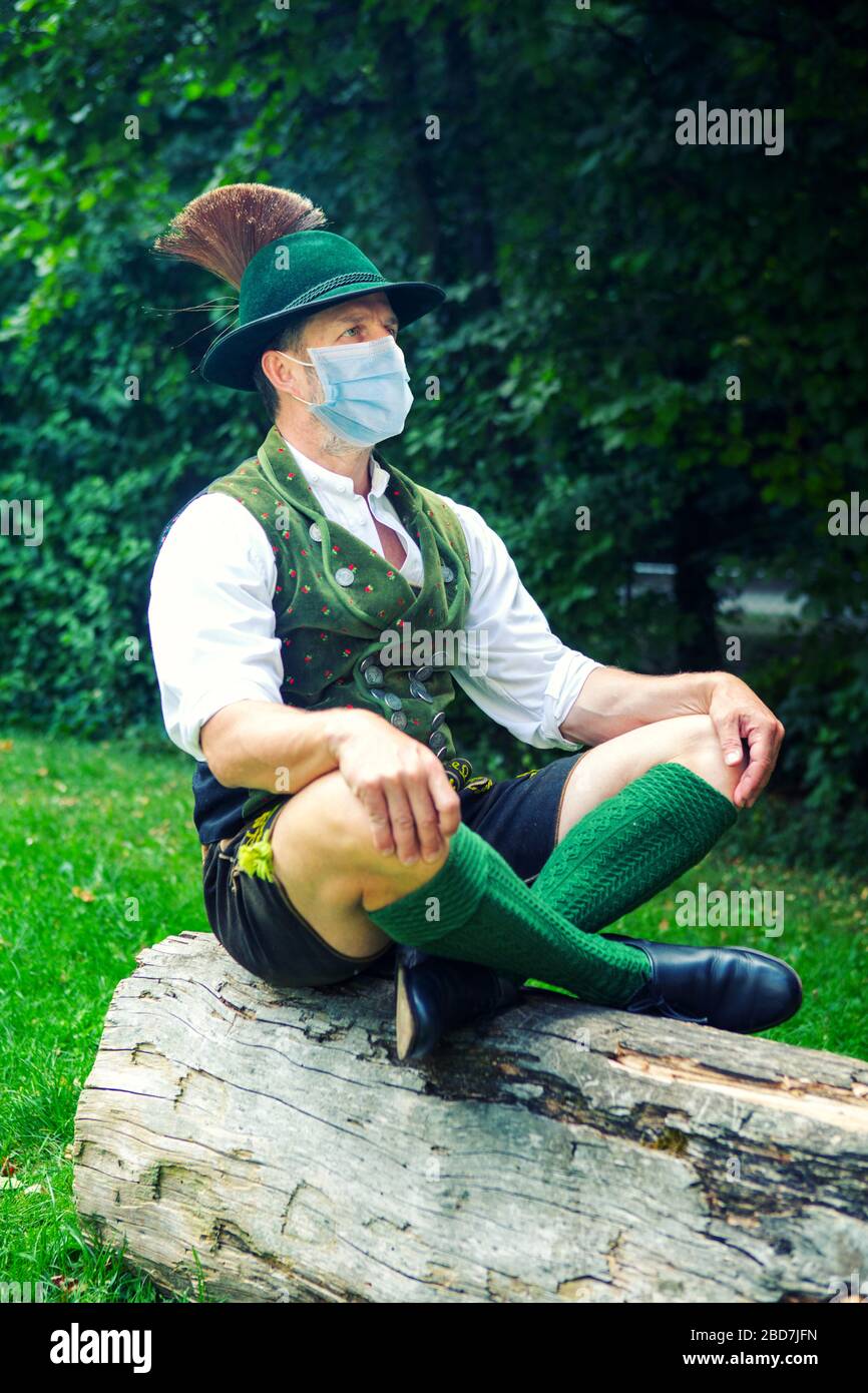 German man wearing traditional lederhosen hi-res stock photography and ...