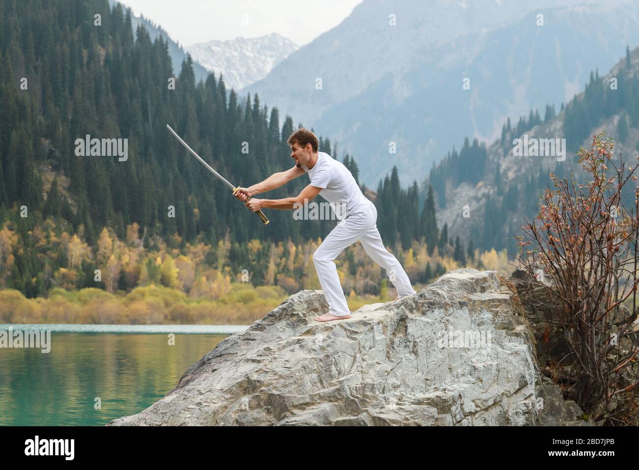A man with a sword goes on the attack on the enemy. The emotional ...