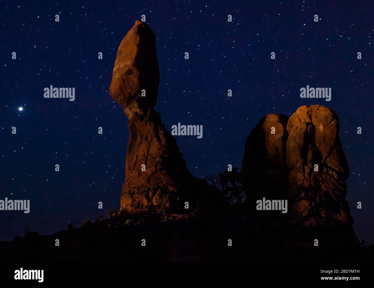 Balanced Rock and a starry night sky in Arches National Park, Utah, USA ...