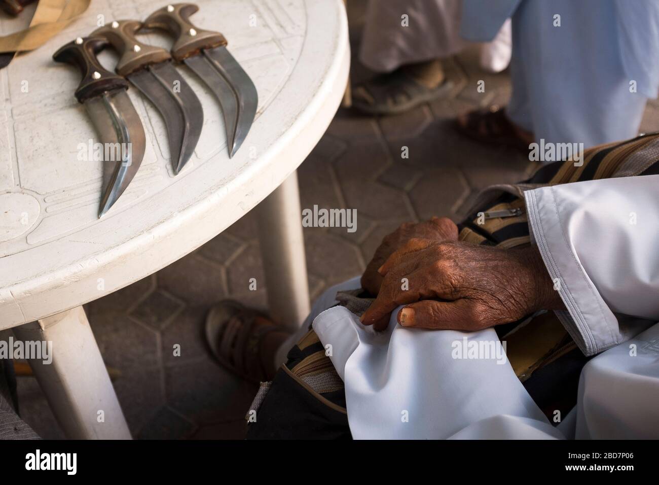 Omani knives called Kanjahs and old rifles are sold on the periphery of ...