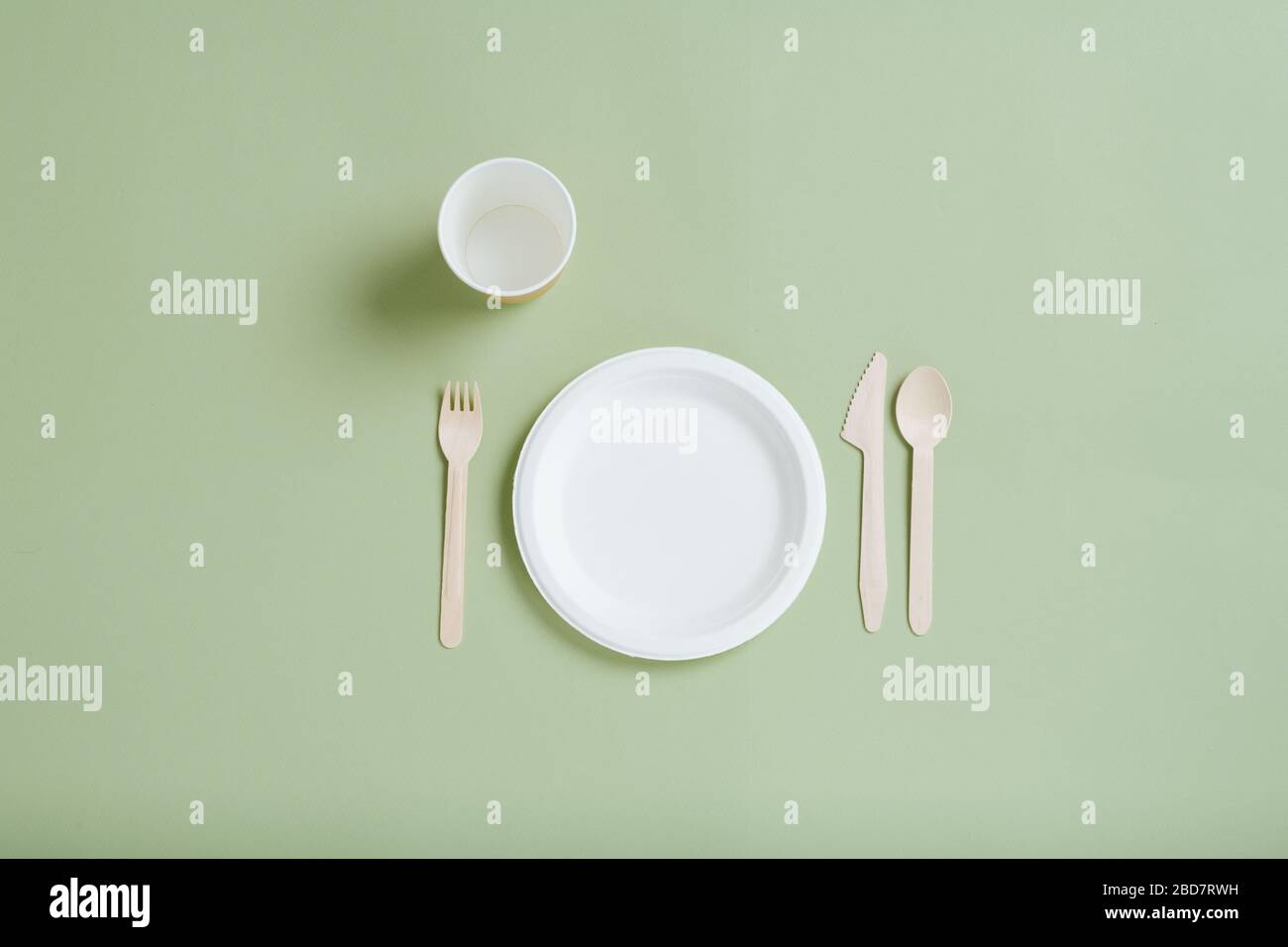 Eco-friendly dinner set. Sugarcane dish and cup with bamboo utensils ...