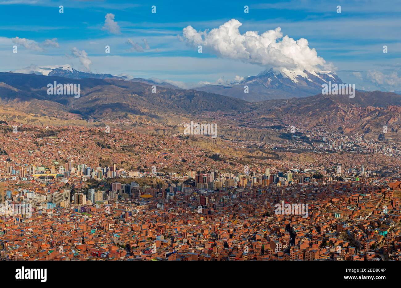 The aerial view of La Paz skyline at high altitude with the Illimani ...