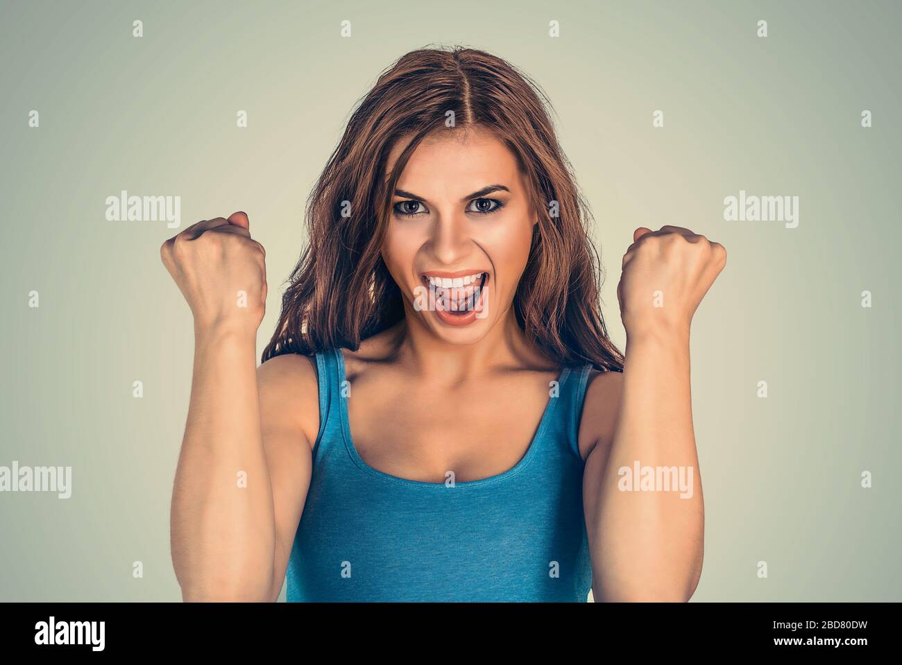 Lucky girl. Closeup portrait happy young woman happy exults pumping ...