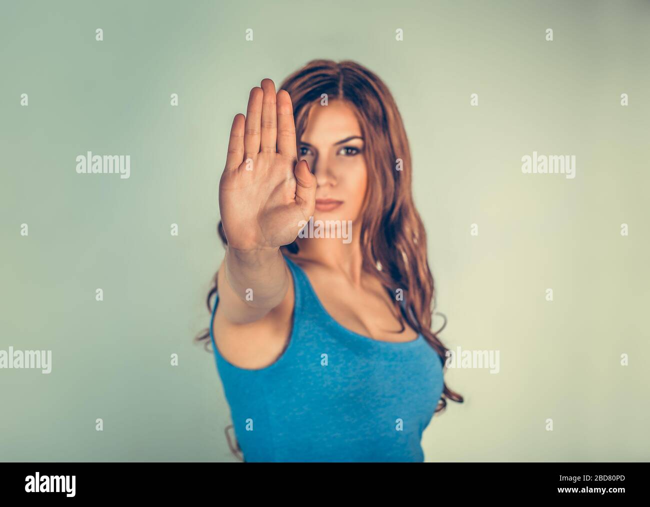 Closeup portrait young angry serious woman showing her denial No Stop ...
