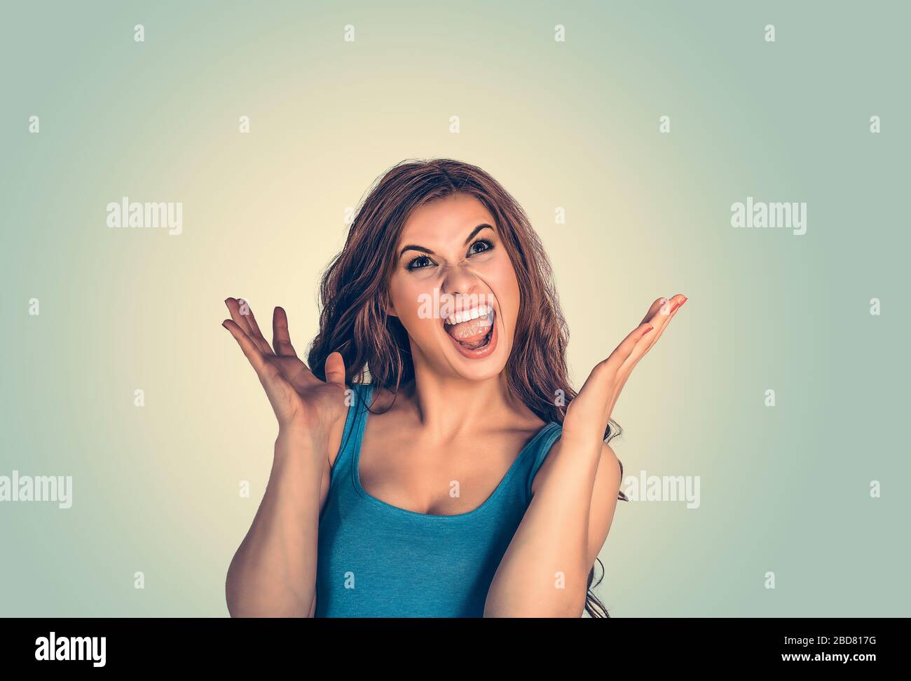 Woman screaming looking up. Closeup portrait young person girl ...