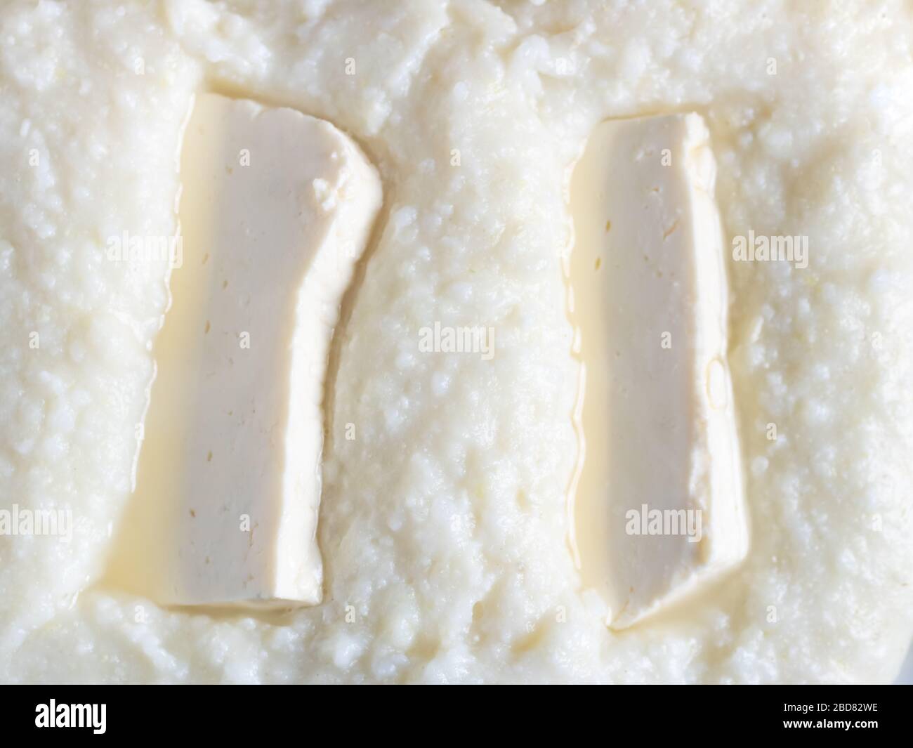 Mengrelian corn mamalica, ghomi with cheese. Georgian traditional food ...