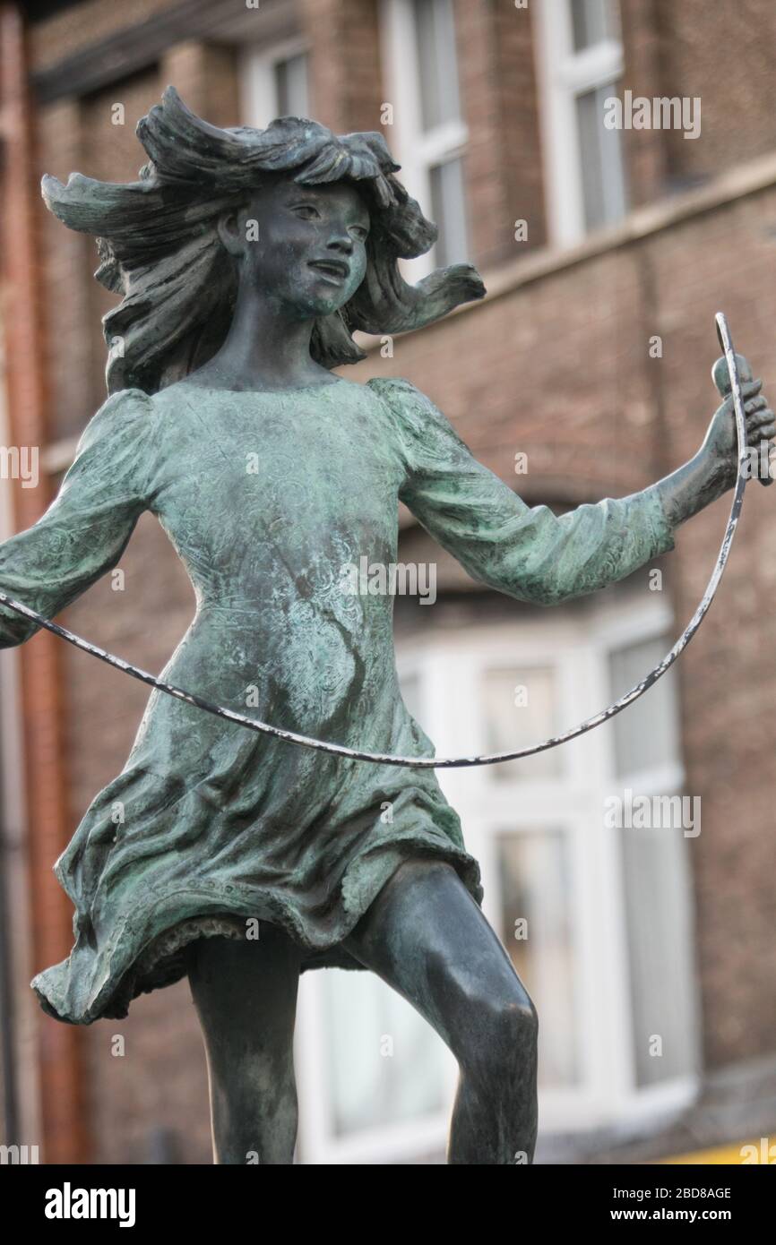 skipping girl Bronze statue in Harrow town centre Stock Photo - Alamy
