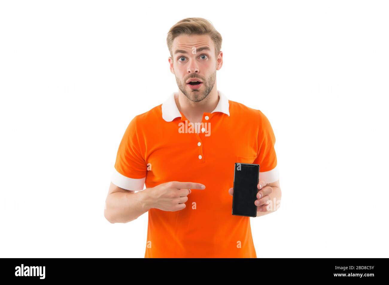 Have you seen this. Surprised man pointing at smartphone isolated on ...