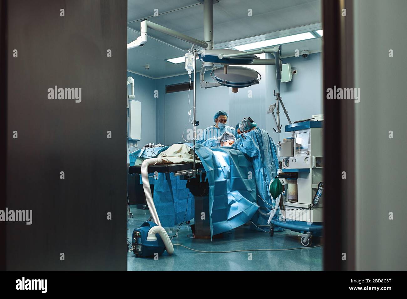 The medical team is preparing the operating room for a complex ...