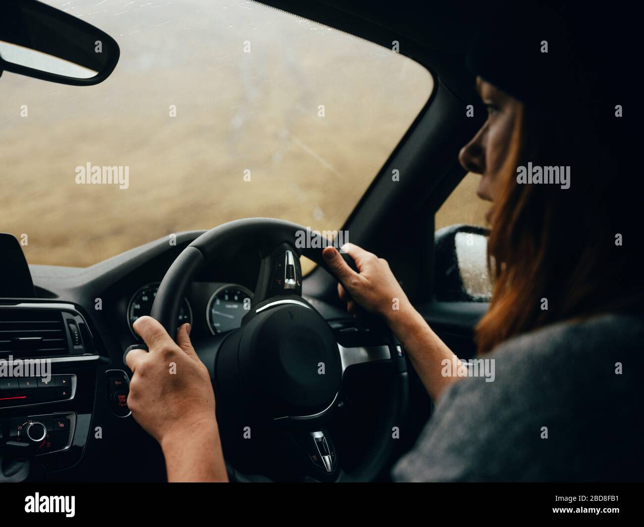 Woman driving car uk hi-res stock photography and images - Alamy
