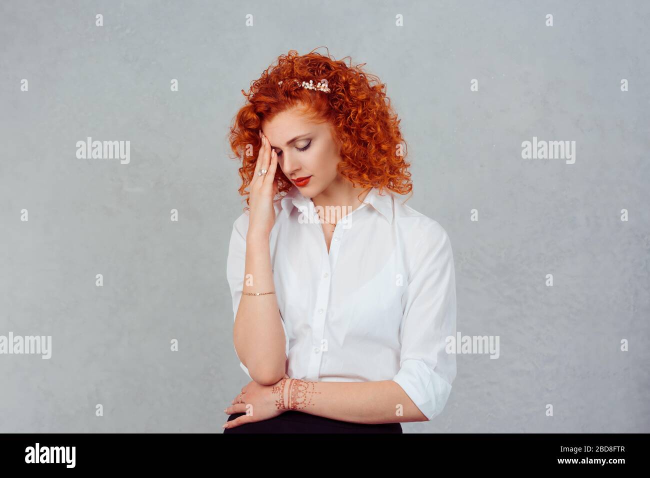 sad young beautiful woman with worried stressed face expression looking ...