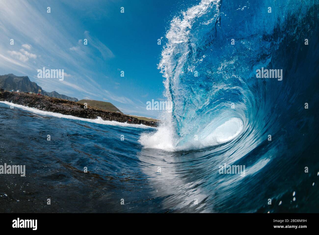 Waves splashing in blue sea on the beach Stock Photo - Alamy