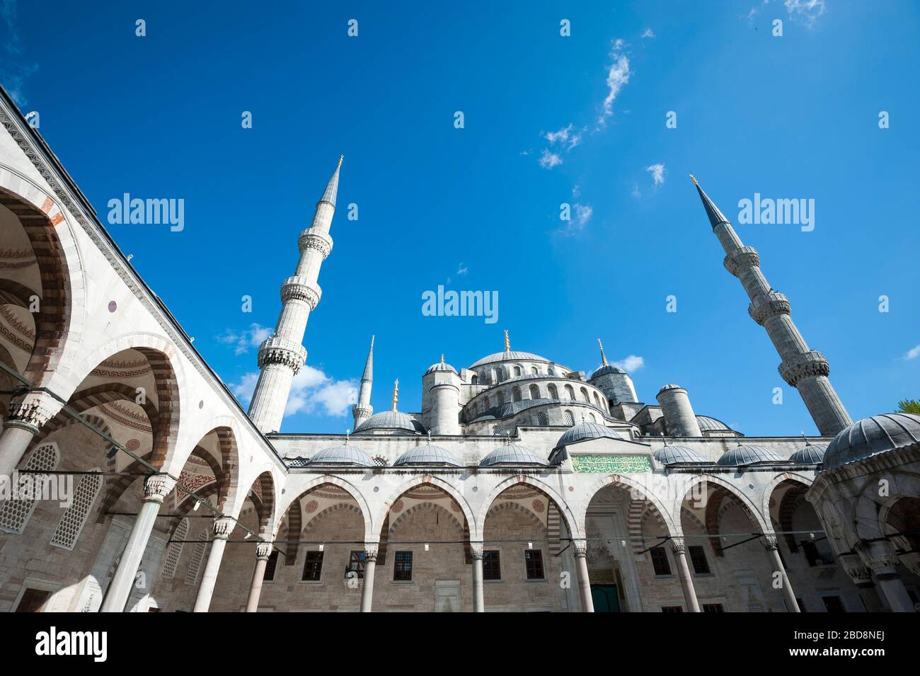 View with traditional stone arches of the courtyard of the Blue Mosque ...