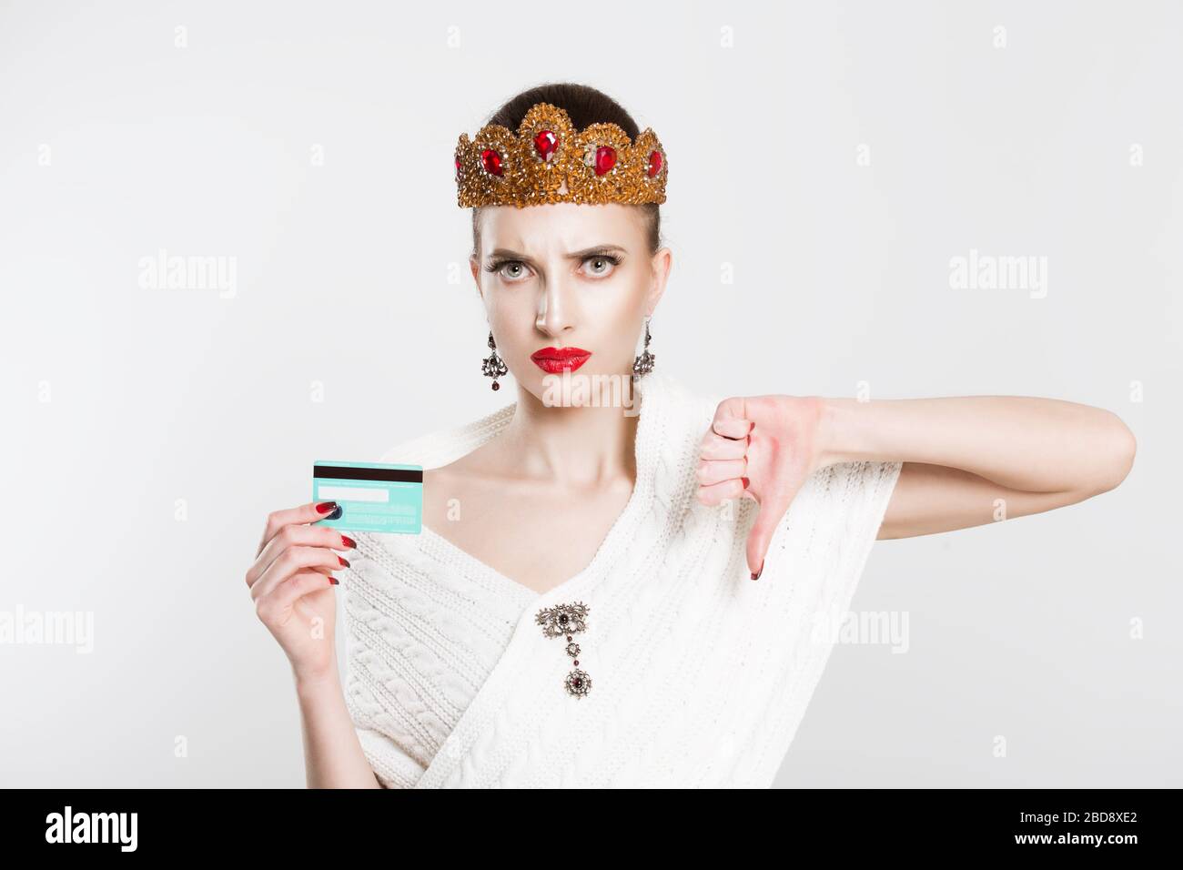 My credit card is blocked. Retro styled woman thumbs down with blank ...