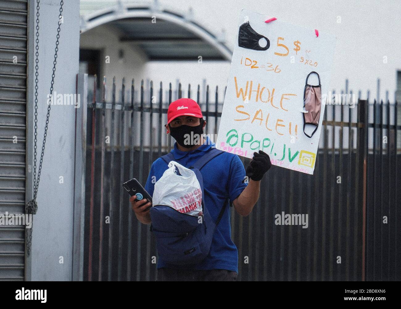 Los Angeles, California, USA. 7th Apr, 2020. A man sells face masks on ...