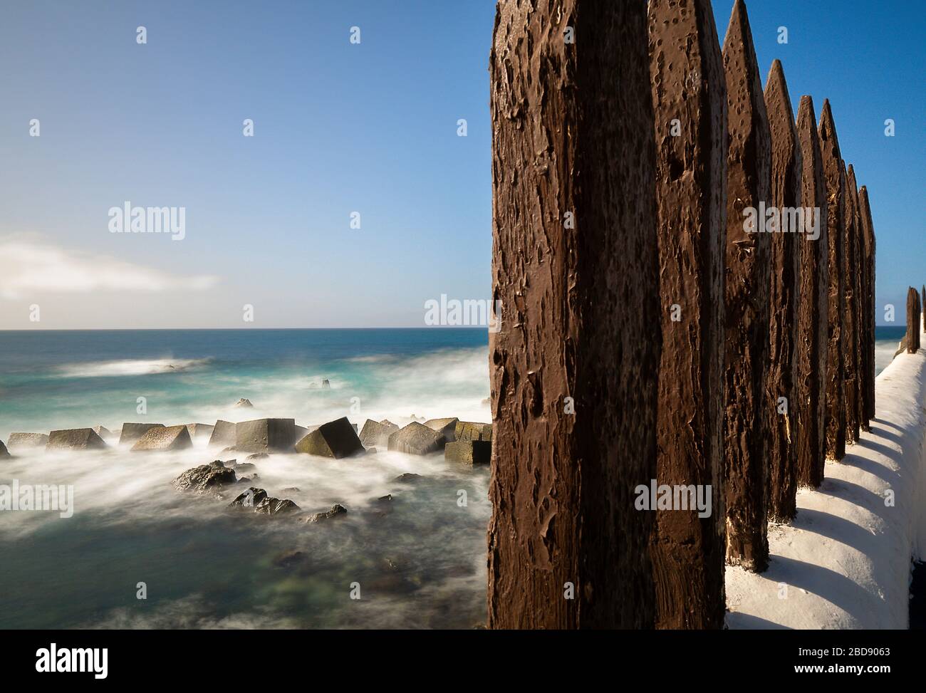 storm surge cliff in the waves detached in wood Stock Photo - Alamy