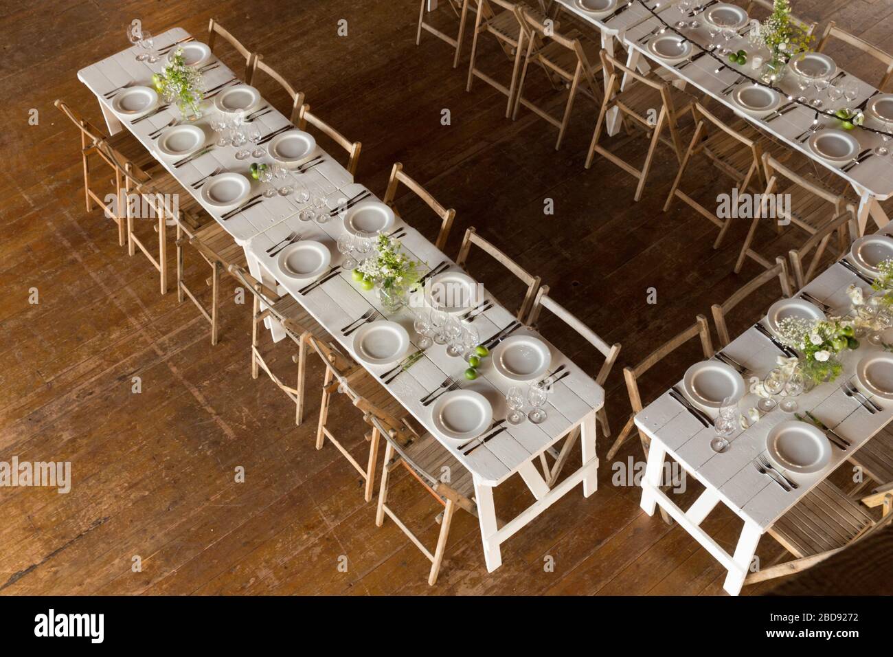 wedding venue with table set up for banquet Stock Photo - Alamy