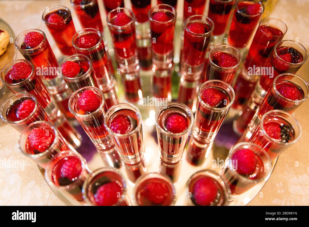 iStock Tray of Glasses Of Bright Pink Raspberry Cocktails Shots Stock ...