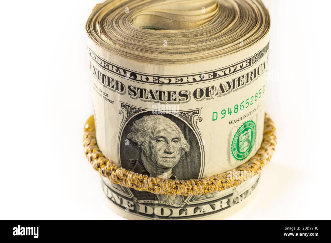 Stack of American dollar bills on top isolated on a white background ...