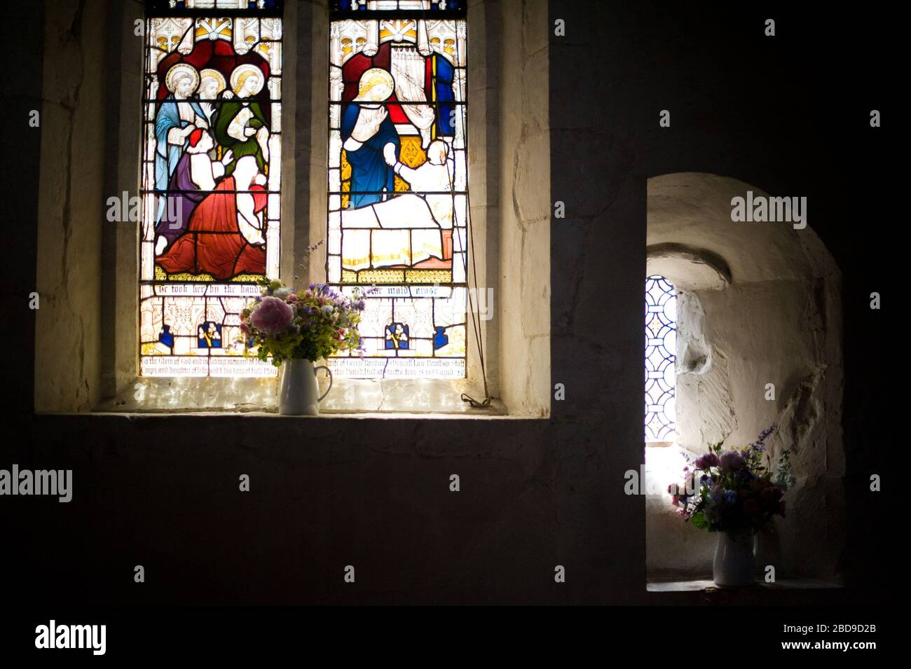 Stained glass windows in an old chapel Stock Photo - Alamy