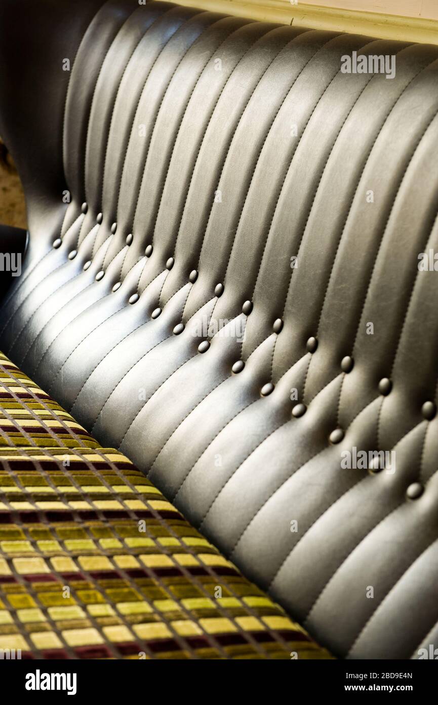 Dark green leather lined seats Stock Photo - Alamy
