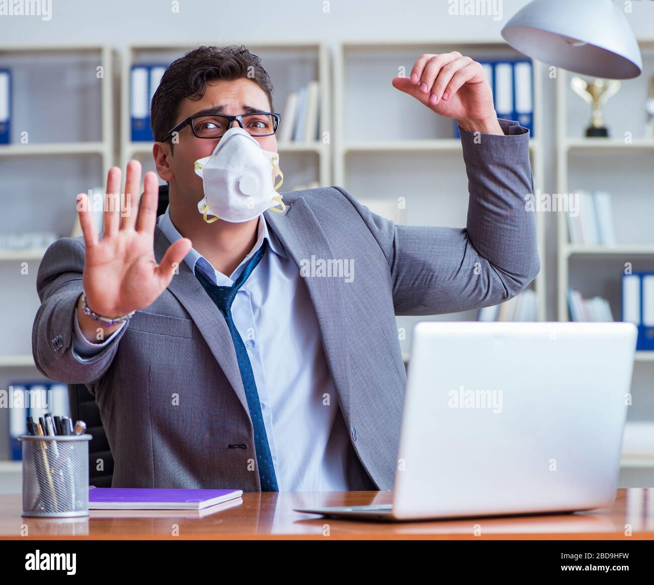 Businessman sweating excessively smelling bad in office at workplace ...